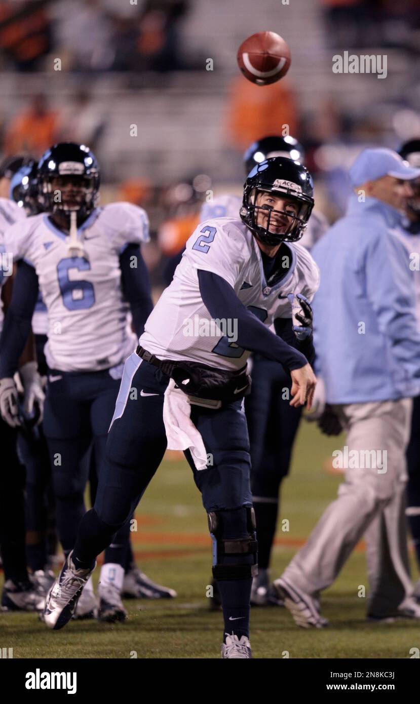 North Carolina quarterback Bryn Renner (2) tosses a pass in warmups ...
