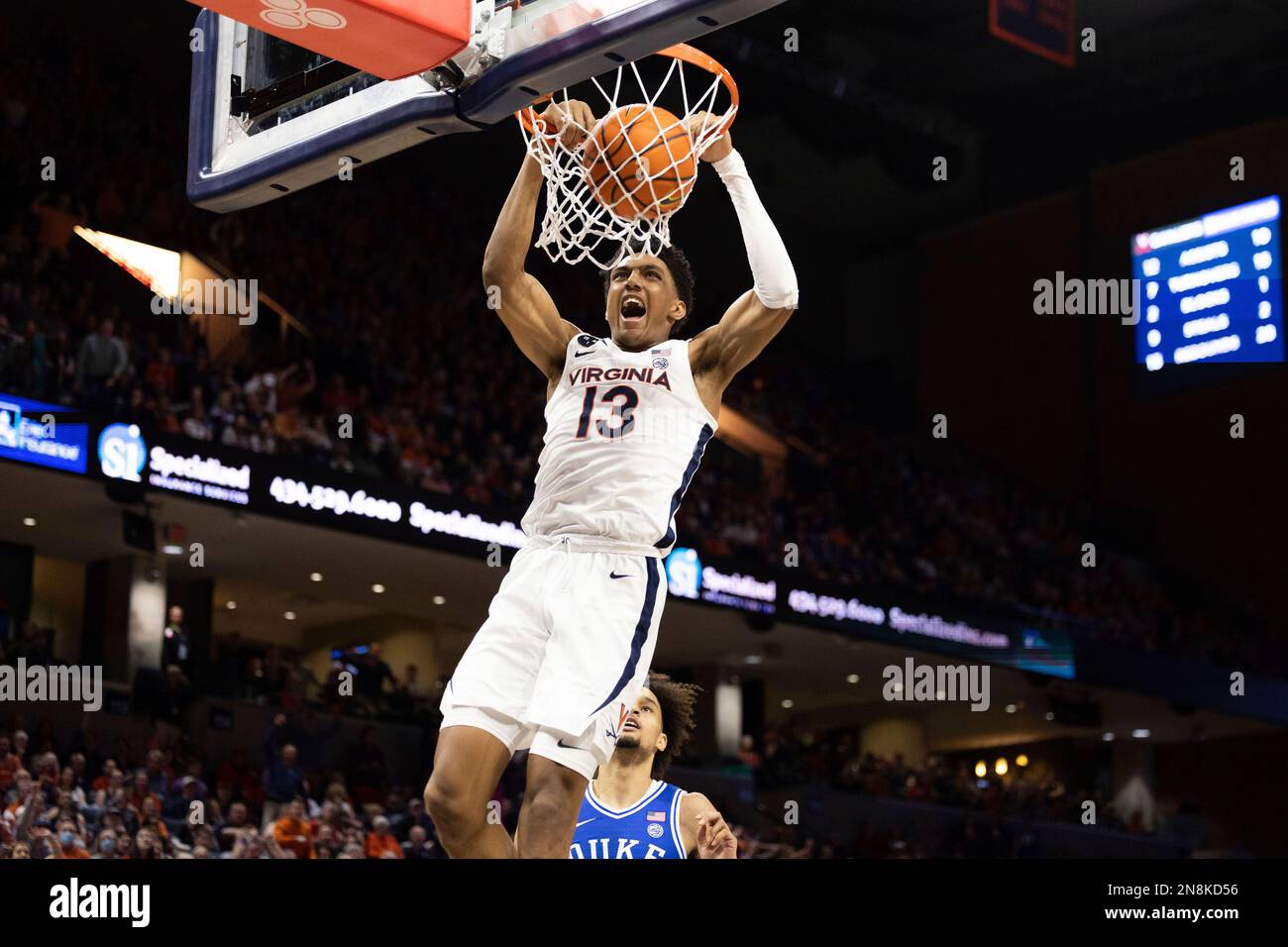 Virginia's Ryan Dunn (13) dunks the ball against Duke during the second ...