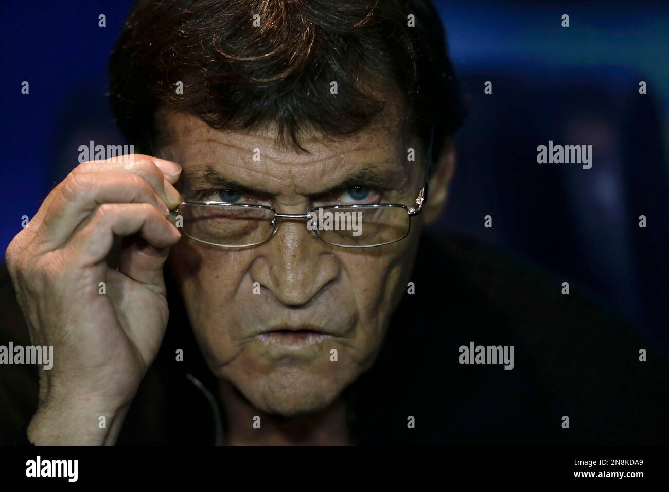 Boca Juniors's coach Julio Cesar Falcioni adjusts his glasses before an ...