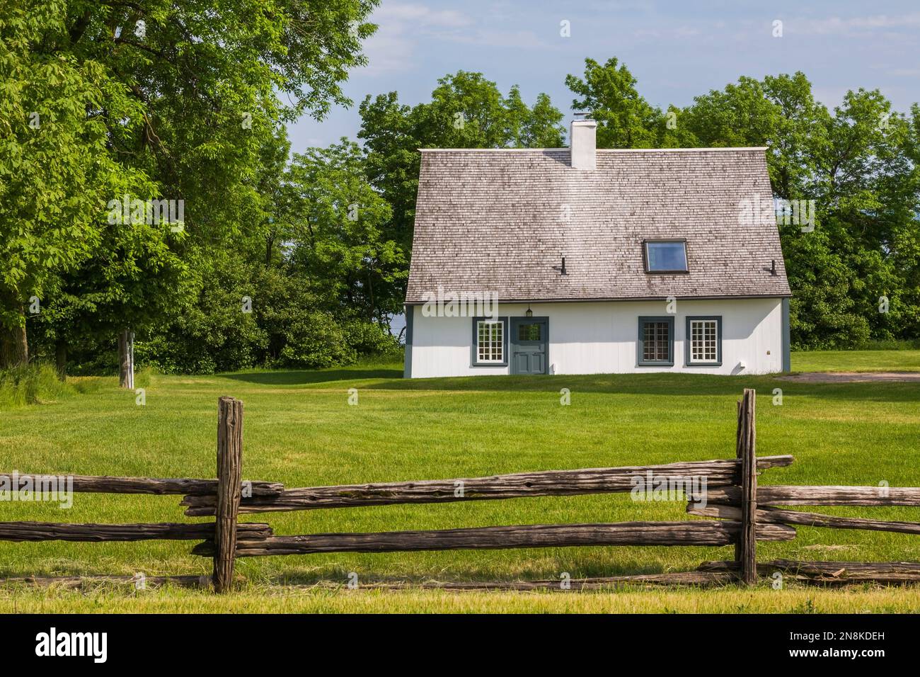 Rear view of old 1809 French regime cottage style home with white ...