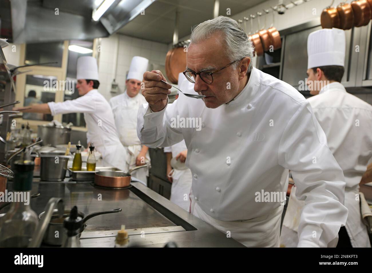 French chef Alain Ducasse, Ducasse poses in the kitchen of his ...