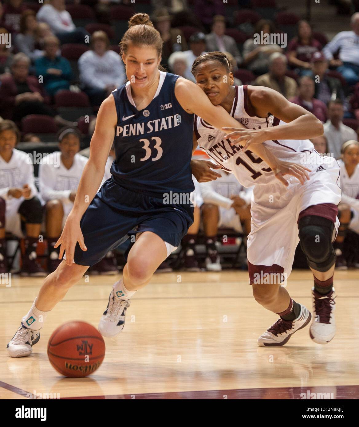 Penn State's Maggie Lucas (33) drives by Texas A&M's Tori Scott (15 ...