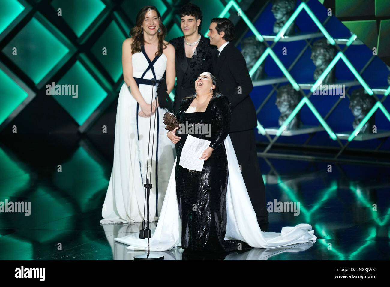 Actress Laura Galan, centre, reacts after winning a Goya award for Best ...