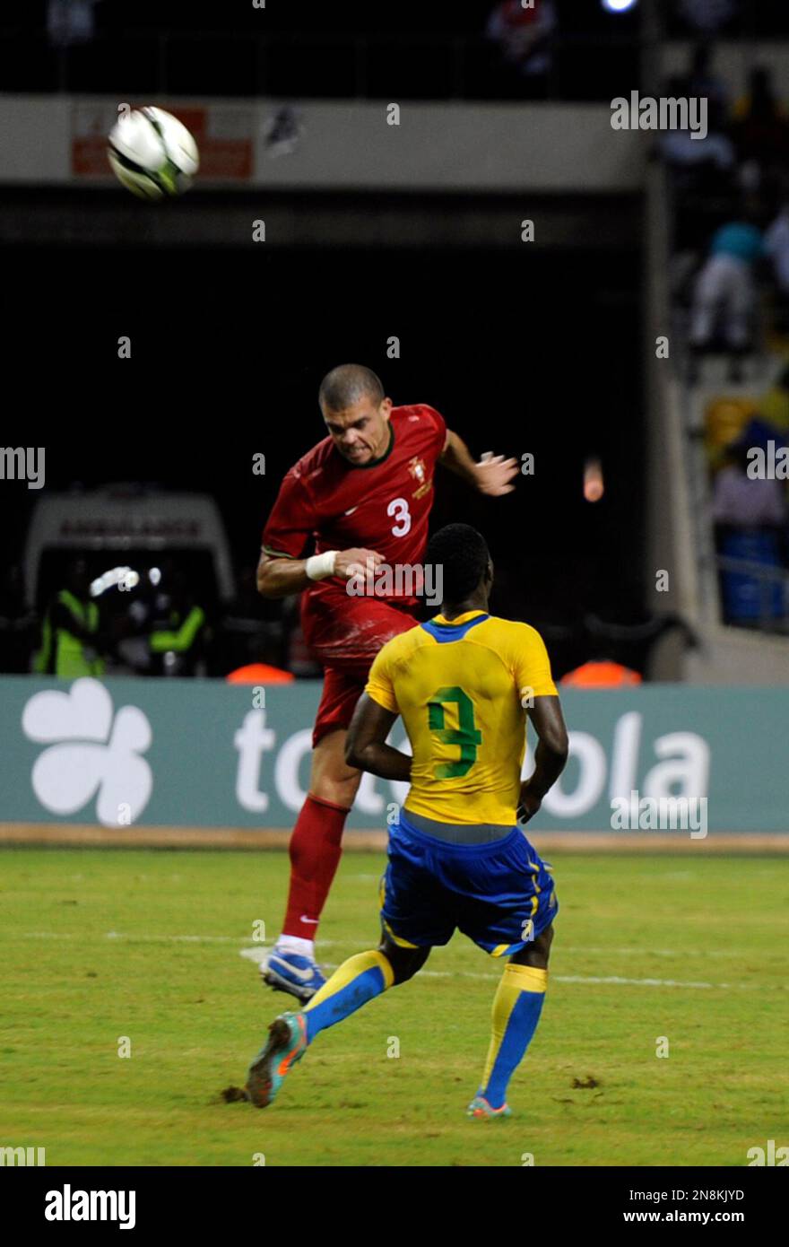 Portugal's Pepe, top, jumps for a header past Gabon's Johan Lengoualama ...