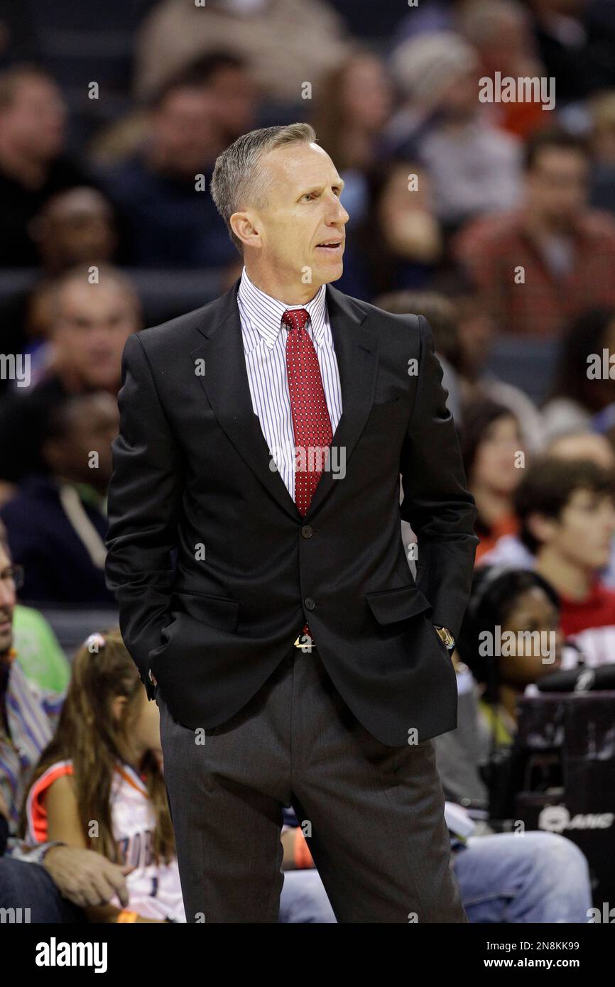 Charlotte Bobcats head coach Mike Dunlap directs his team against the ...