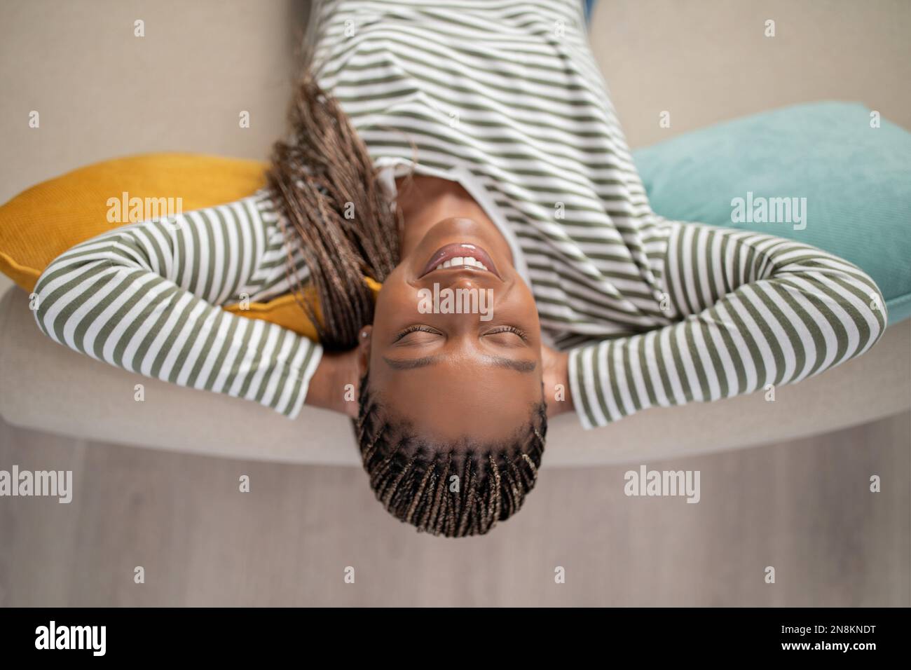 Young resting woman dreadlocks sitting hi-res stock photography and ...