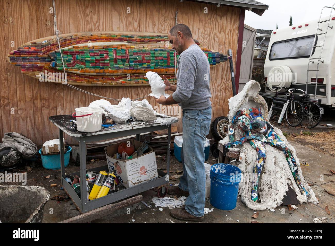 In this Thursday, Nov. 8, 2012 photo, artist Marcus Eriksen, a Gulf War ...