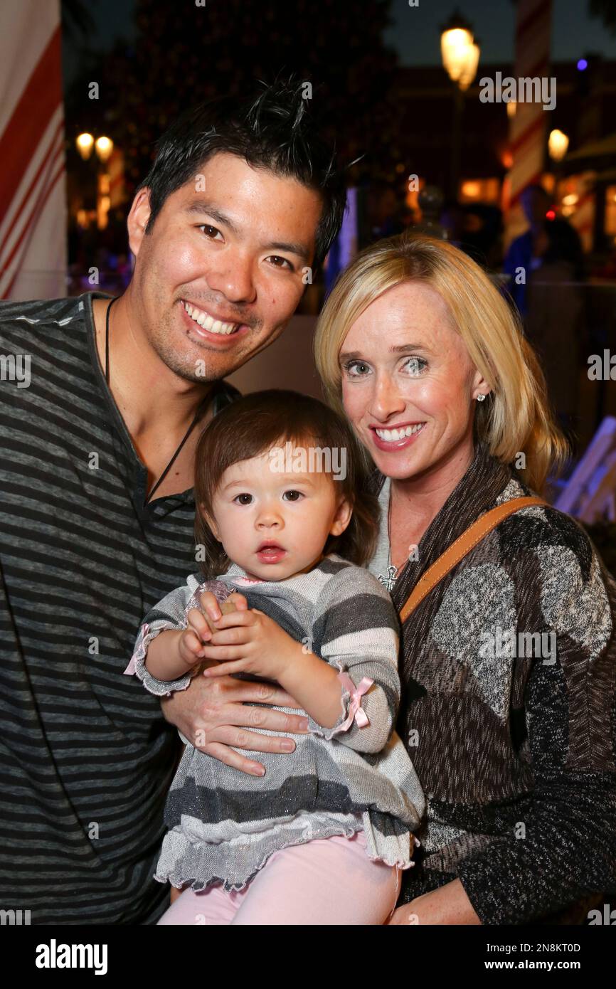 From left, Kurt Suzuki, Major League Baseball catcher with daughter ...