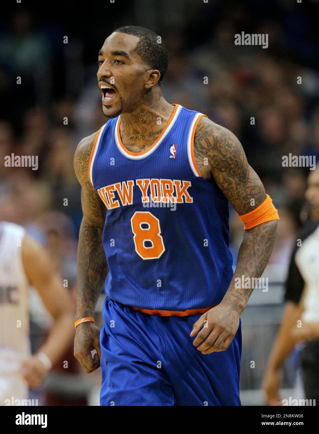 New York Knicks' J.R. Smith shout towards his team bench after making a ...