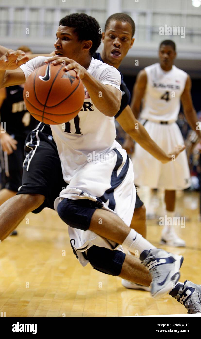 Xavier guard Dee Davis (11) drives against Butler guard Devontae Morgan ...