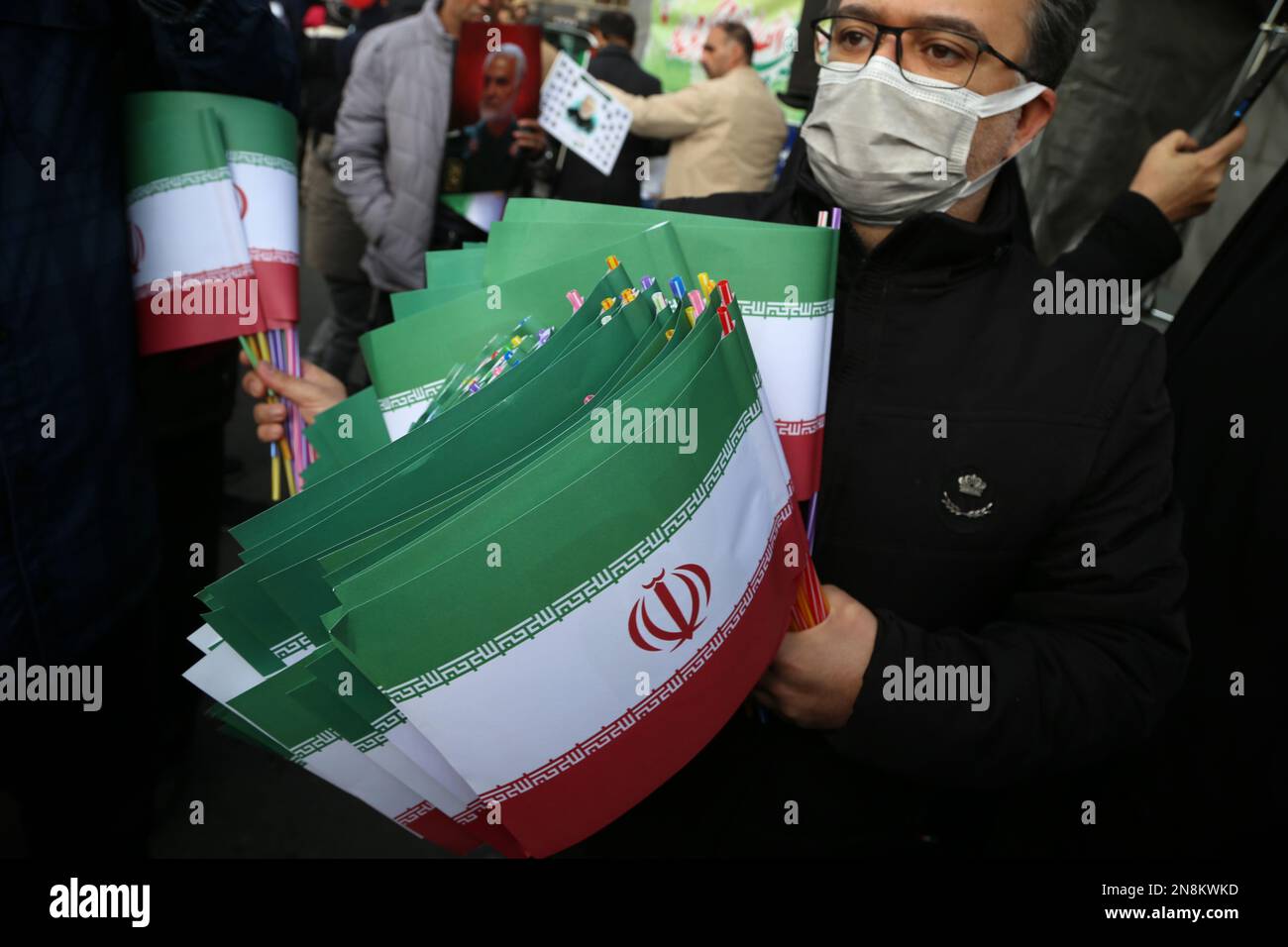 Tehran, Tehran, Iran. 11th Feb, 2023. An Iranian man wearing a ...