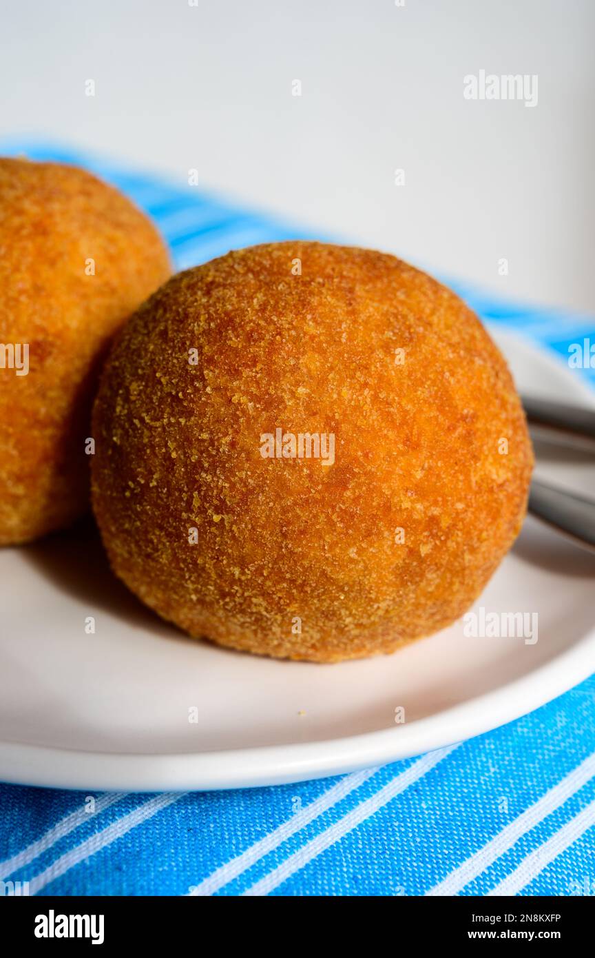 Traditional street food in UK, stuffed fried Scotch eggs with ...
