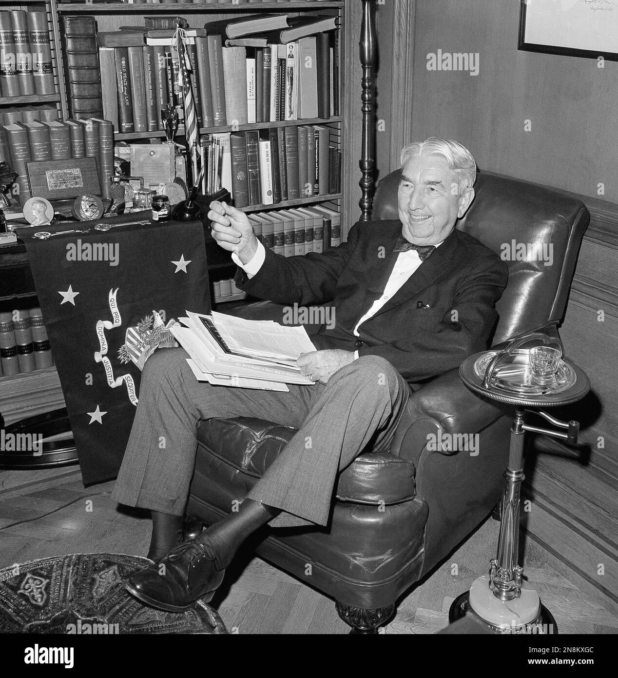 Associate Justice Tom Clark of the Supreme Court relaxes in his ...
