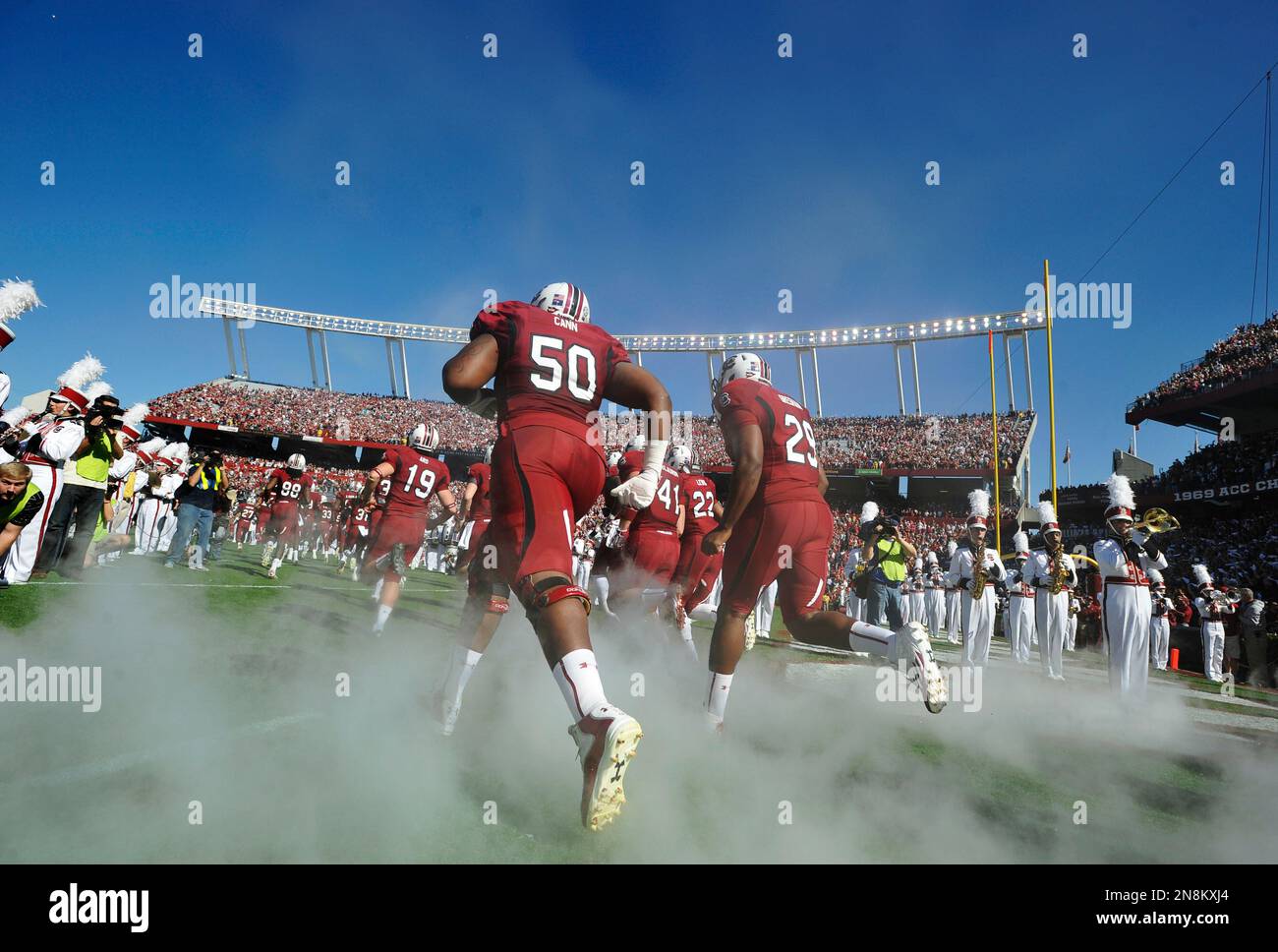 The South Carolina team heads to the field before an NCAA college ...