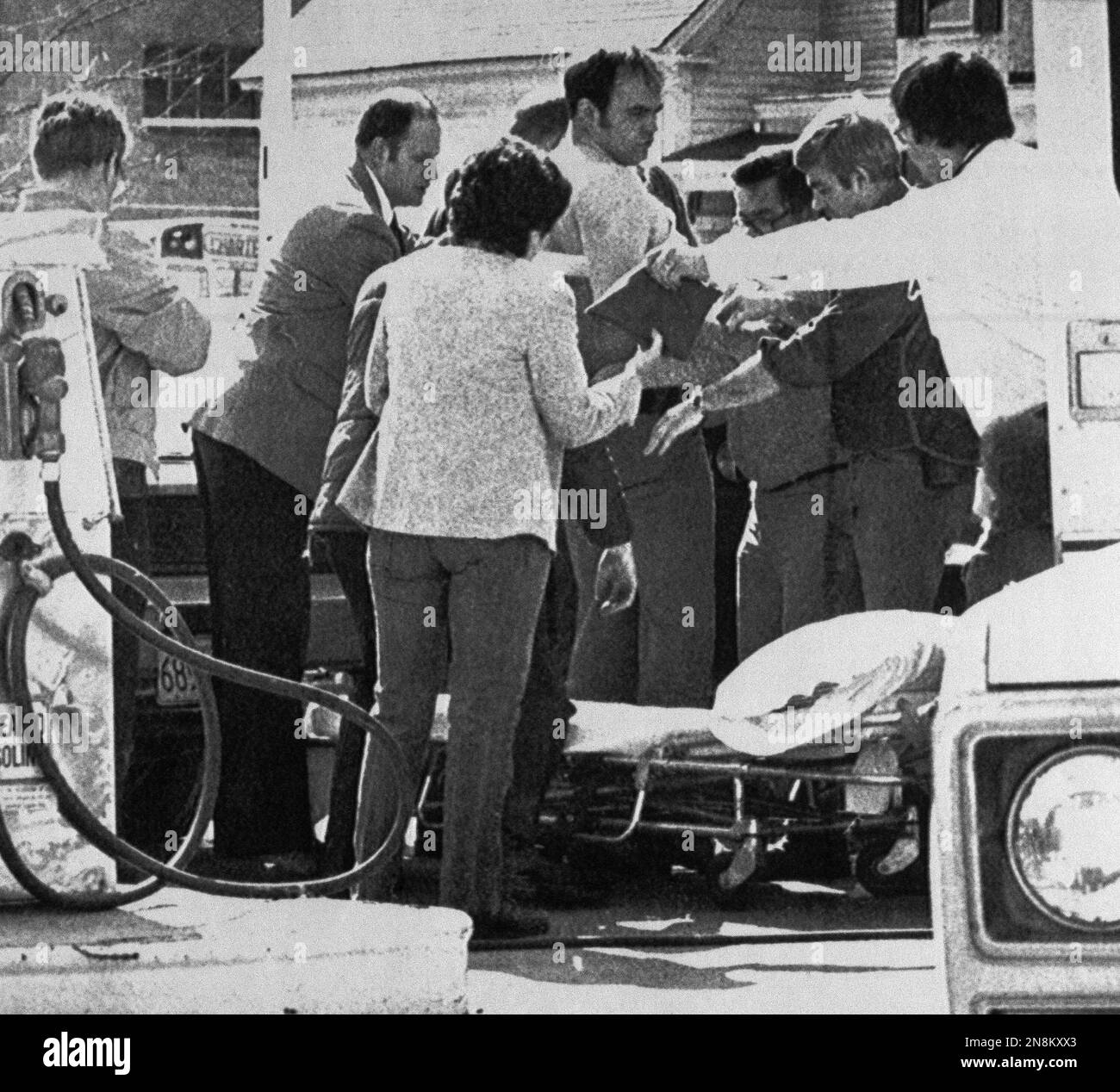 New Hampshire state trooper Leo Jellison is attended to by ambulance ...