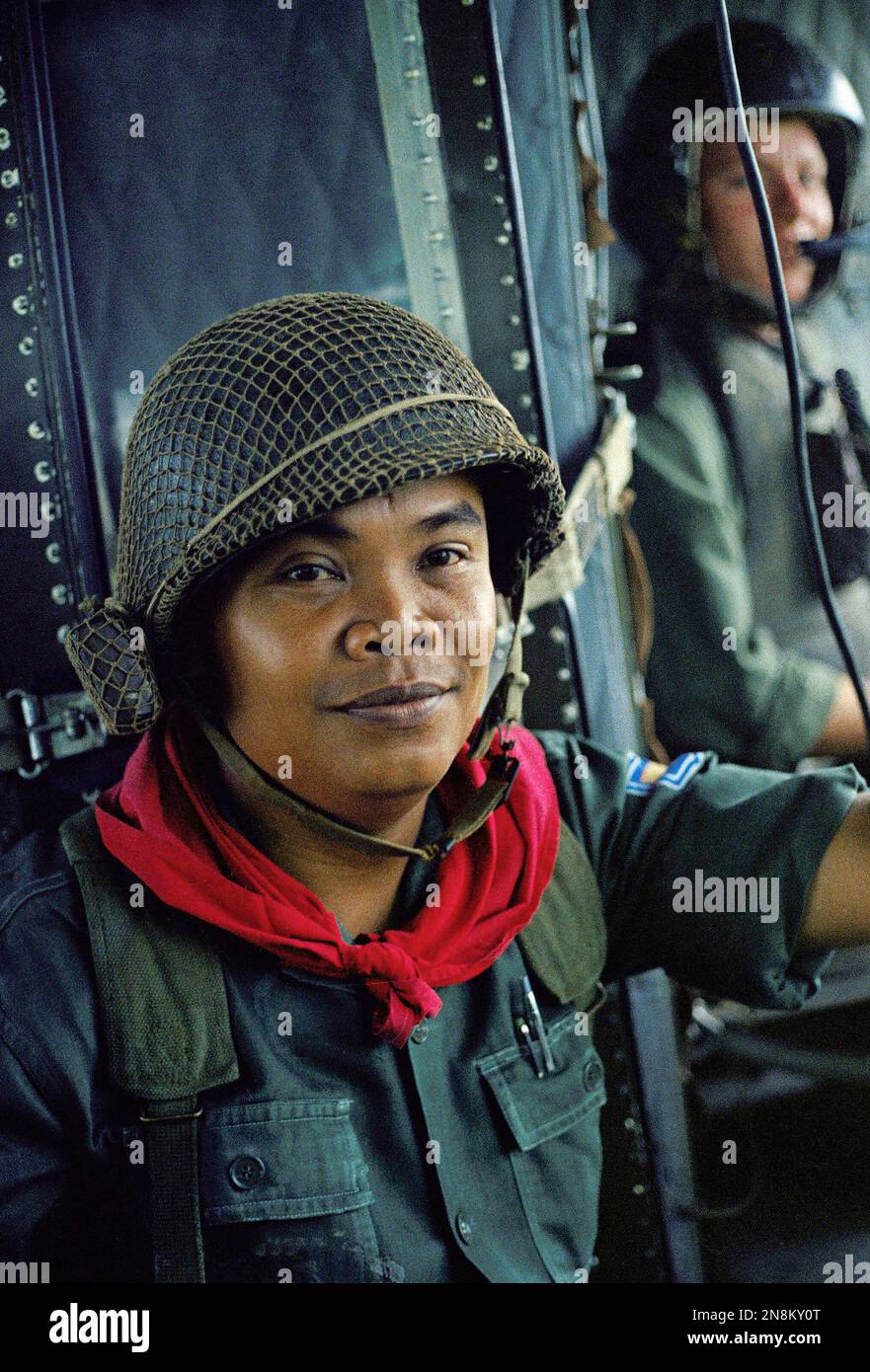 Battalion commander, Major Bui Van Luu, 37, aboard a helicopter bound ...