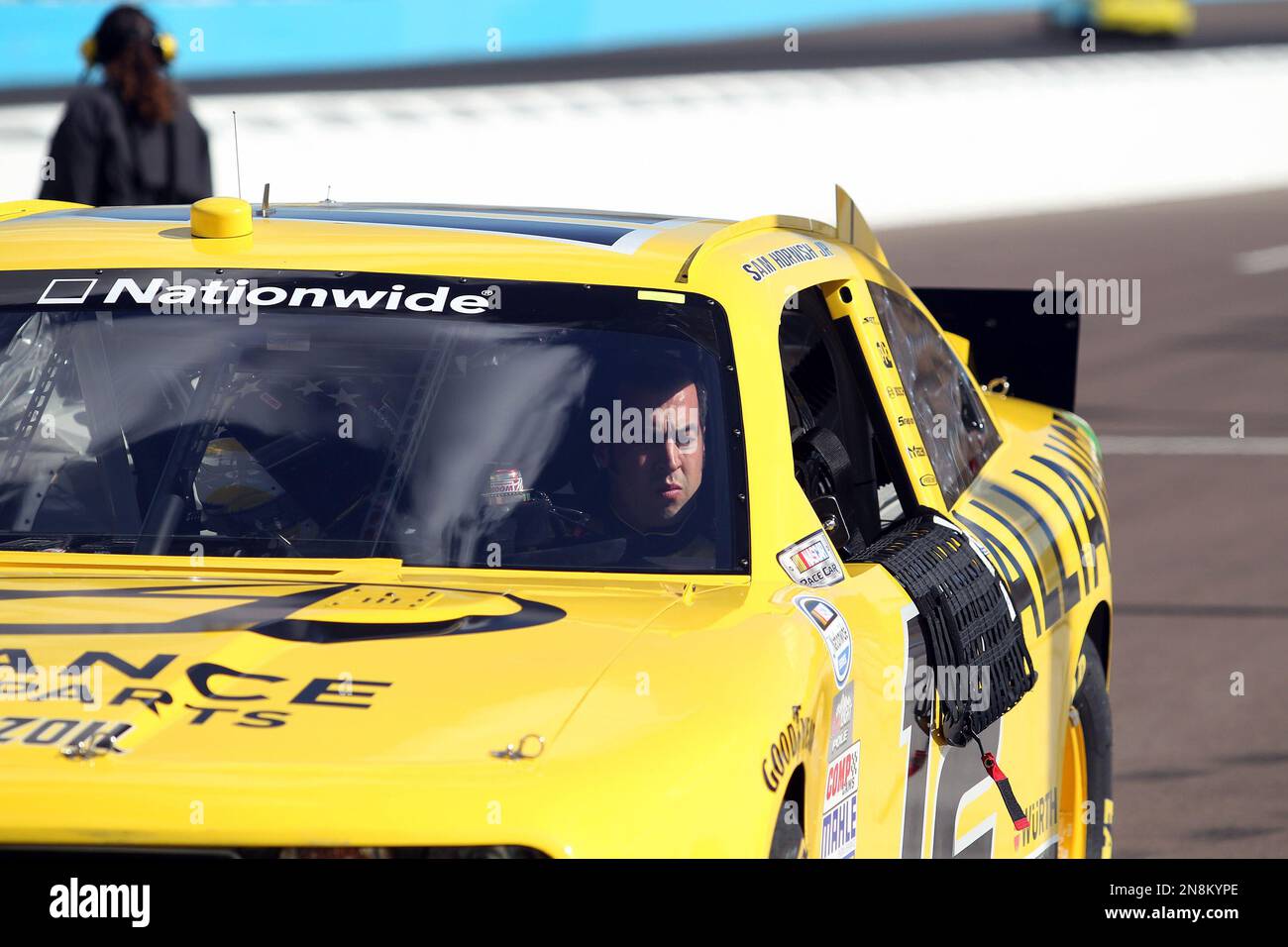 Driver Sam Hornish, Jr. sits in his car after qualifying for the NASCAR ...