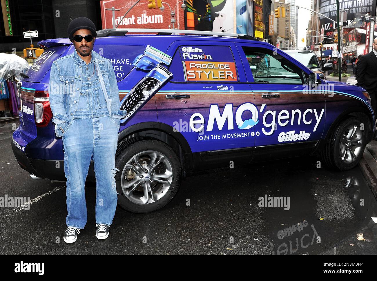Andre 3000 Benjamin poses with the eMO’gency Tour vehicle and Gillette ...