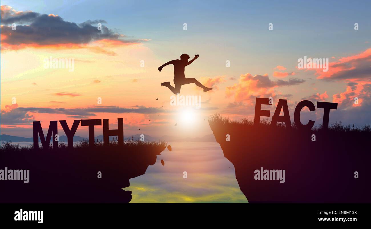 Silhouette man jumping from MYTH to FACT wording on cliffs with cloud ...