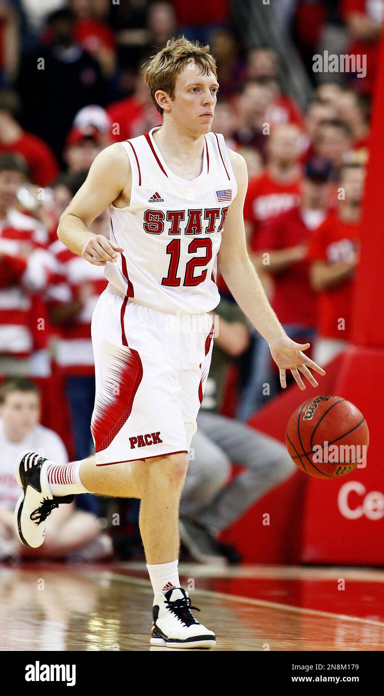 North Carolina State's Tyler Lewis (12) brings the ball down court ...