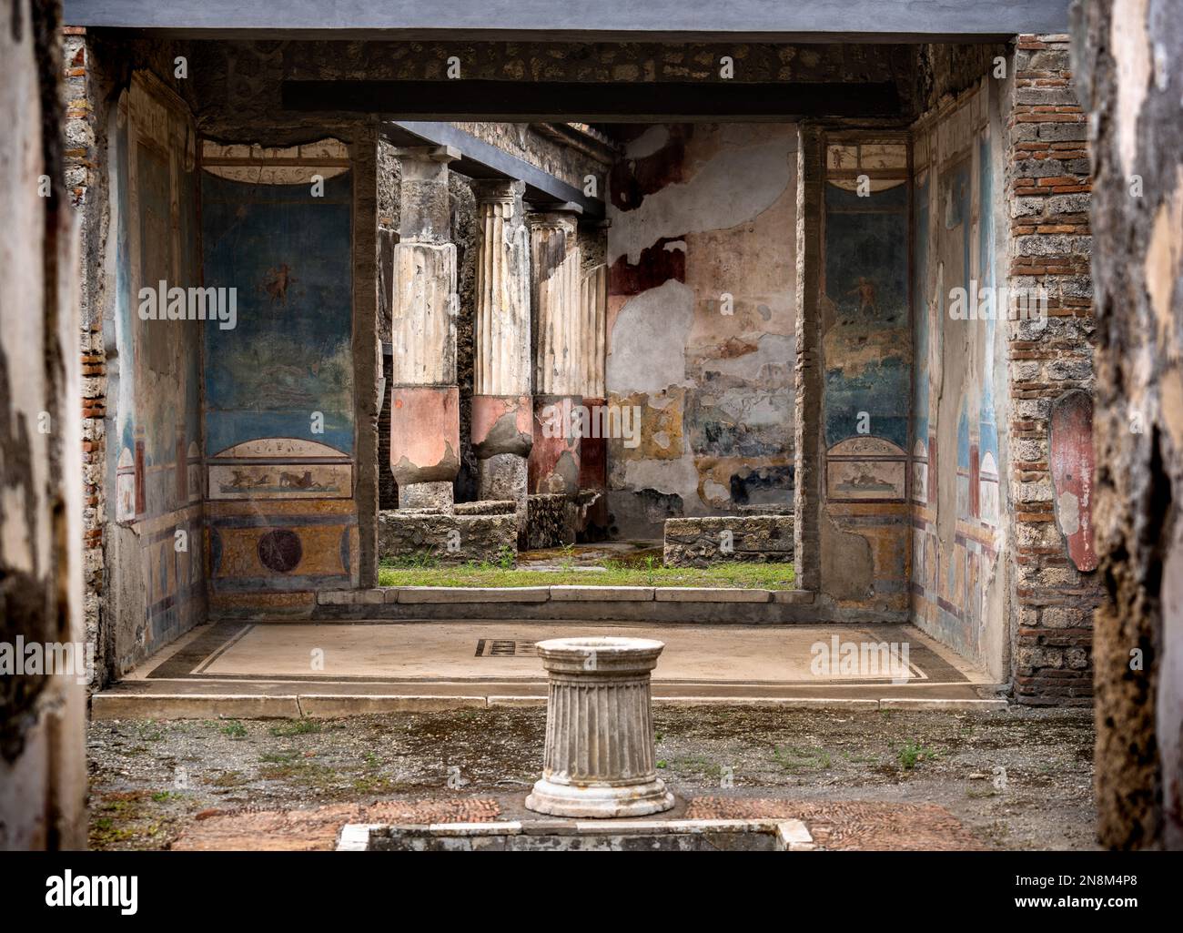 Colorful frescoes adorning the atrium/courtyard of the House of Caccia ...