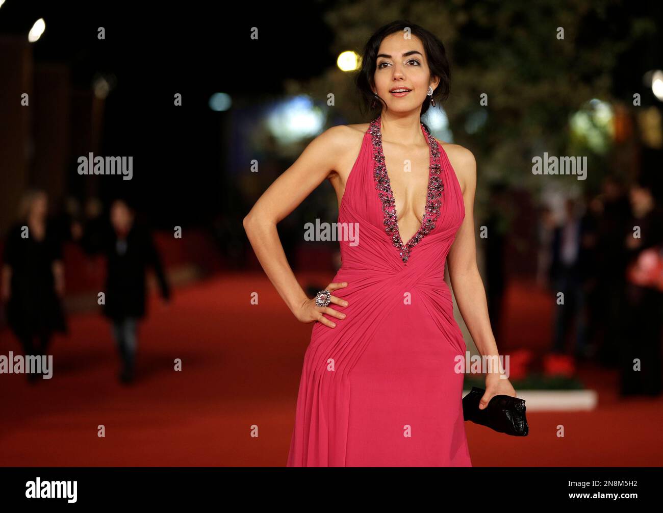 Actress Tina Rodriguez poses for photographers as she arrives for the screening of her movie ...