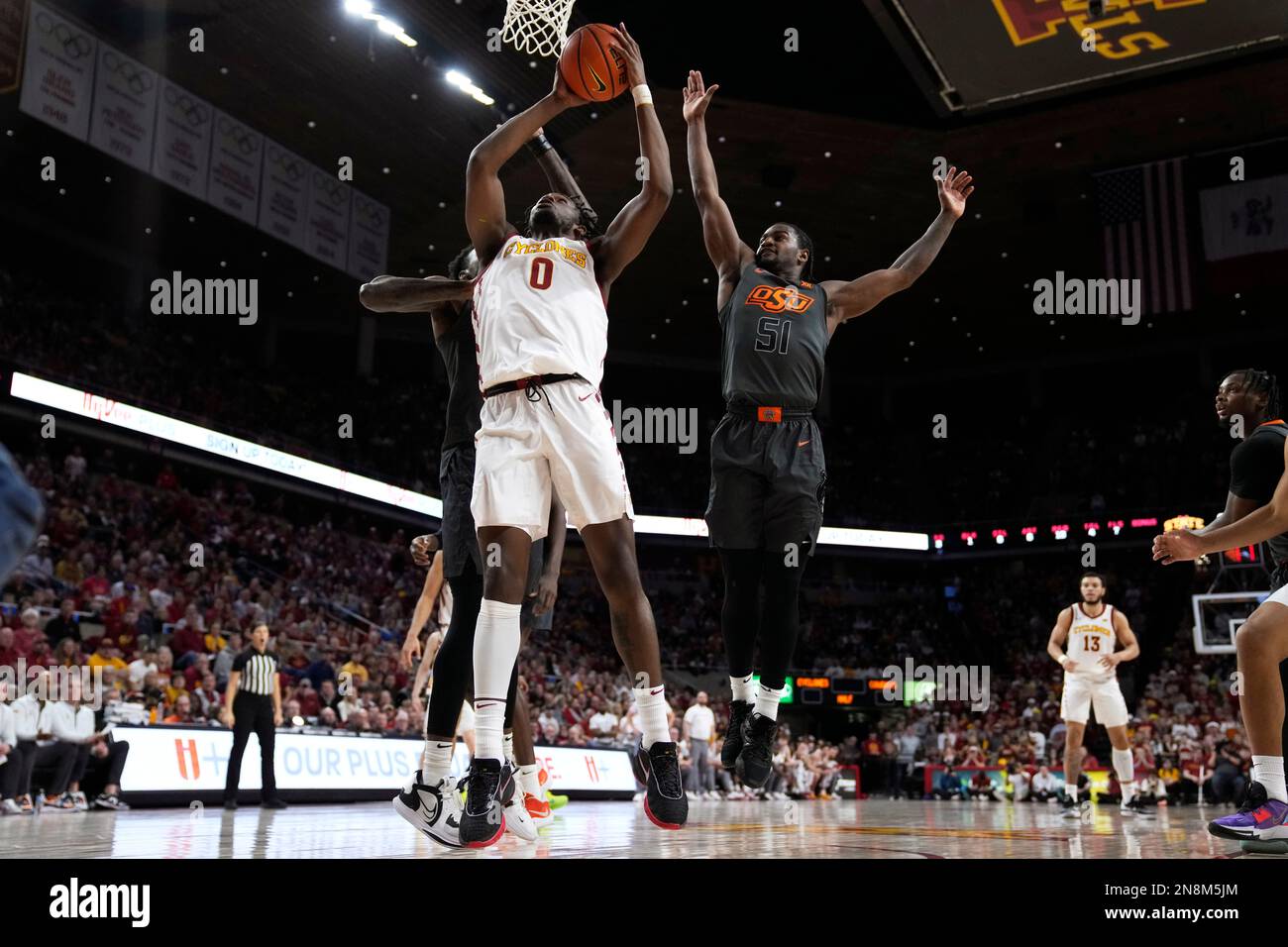 Iowa State forward Tre King (0) drives to the basket past Oklahoma ...