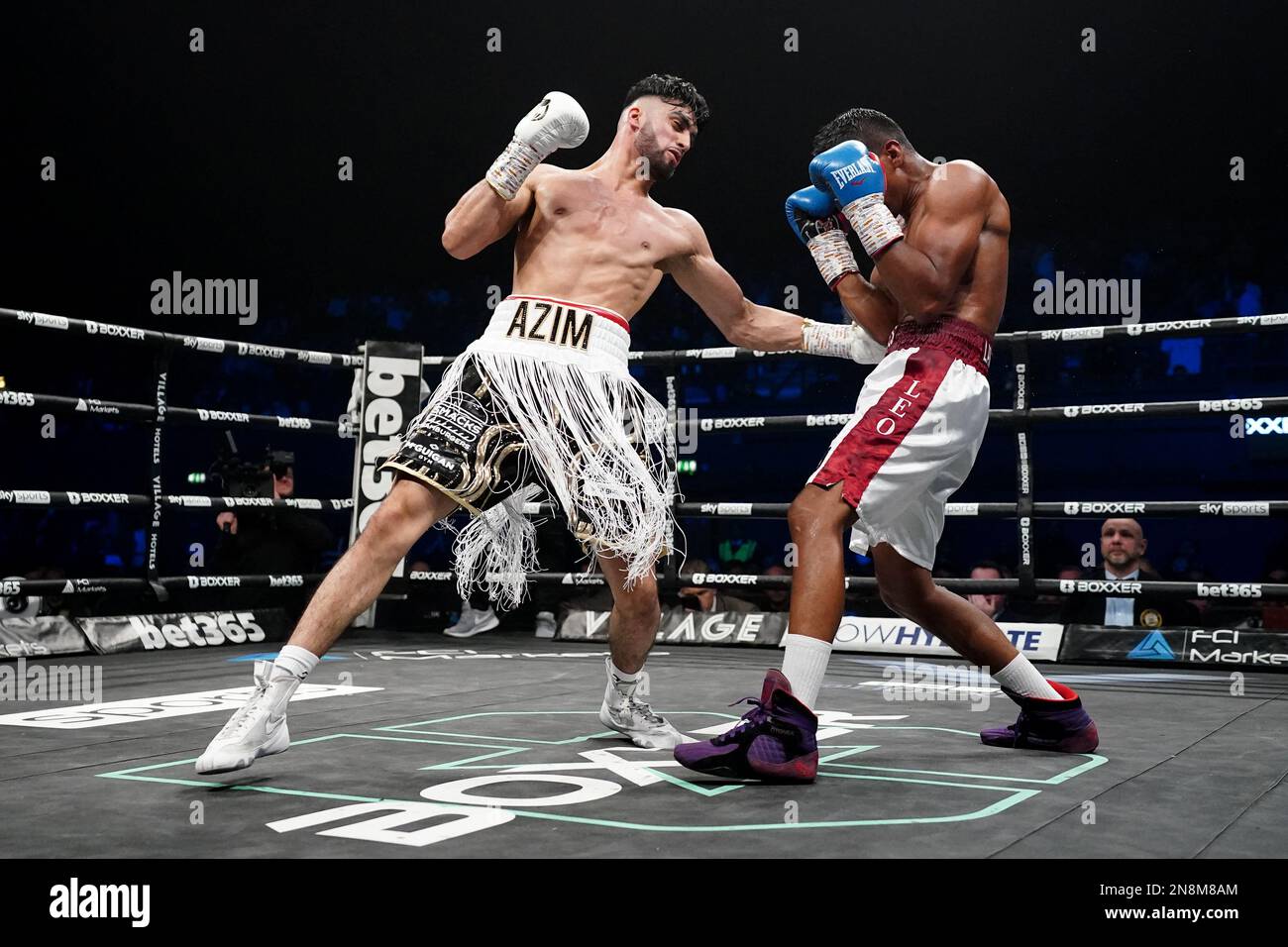 Adam Azim in action against Santos Reyes at the OVO Arena Wembley ...