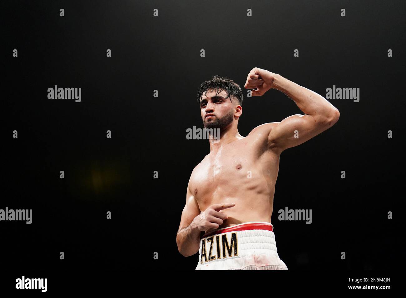 Adam Azim celebrates victory over Santos Reyes at the OVO Arena Wembley ...