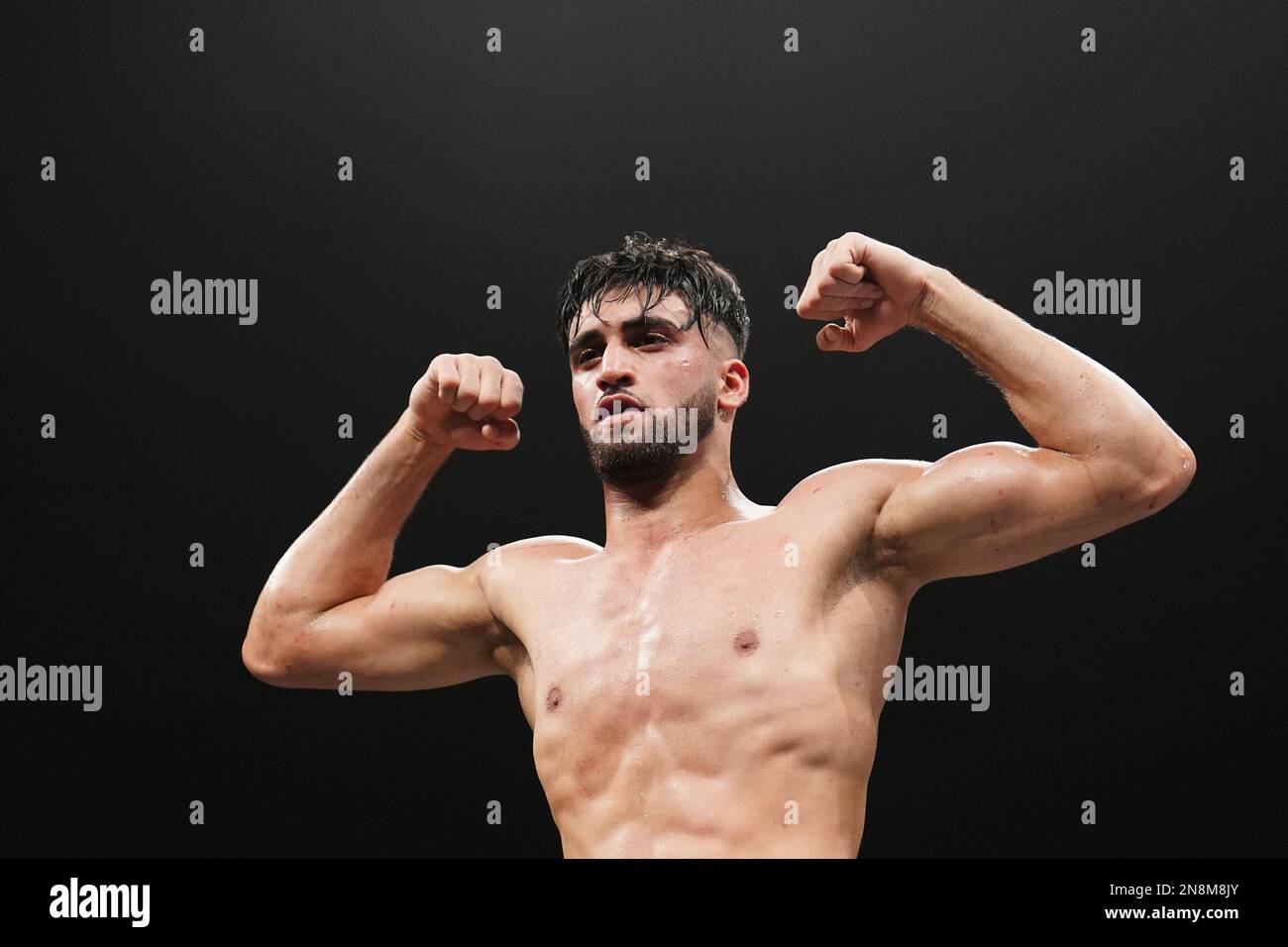 Adam Azim celebrates victory over Santos Reyes at the OVO Arena Wembley ...