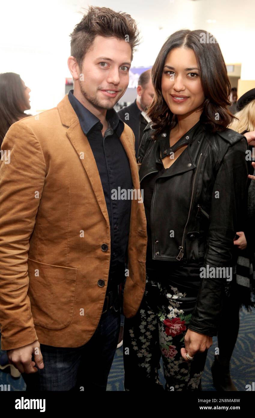 Julia Jones, right, and Jackson Rathbone pose for a photo at the Time ...