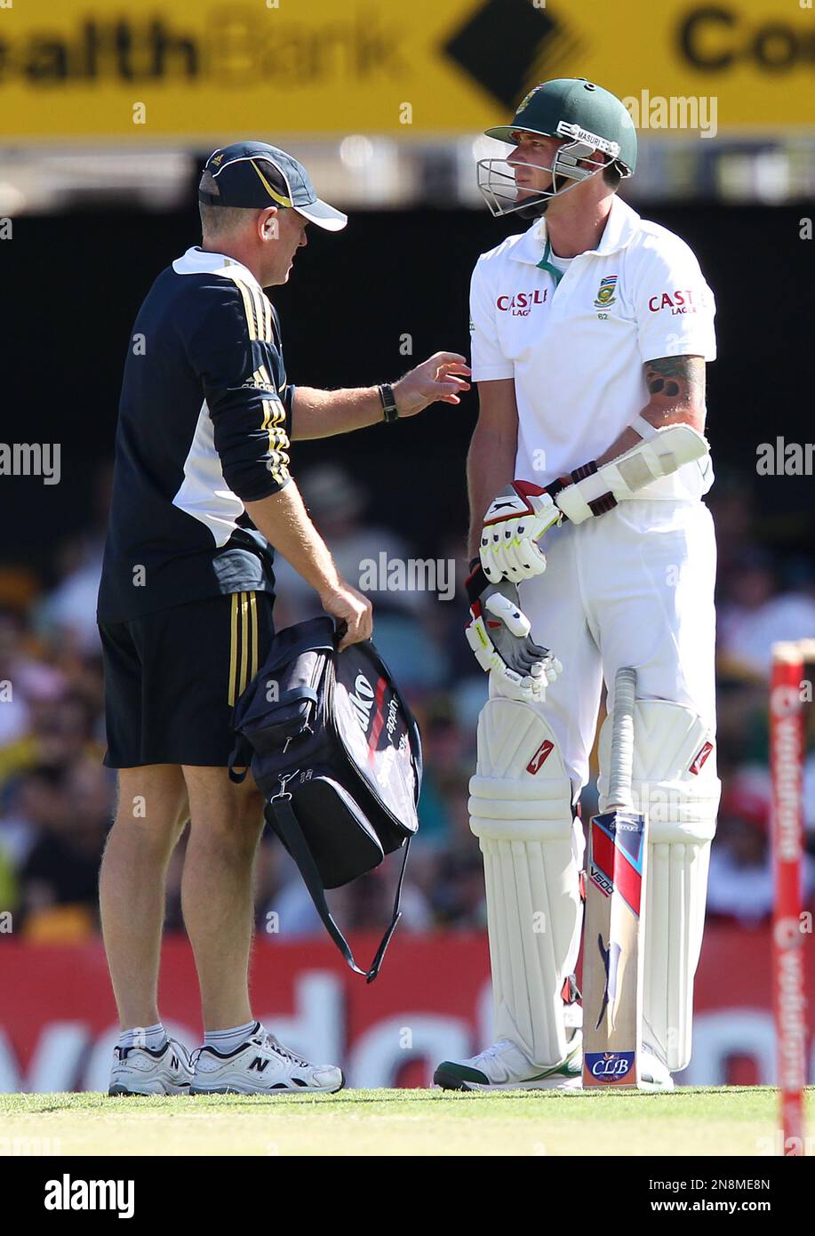 South Africa's Dale Steyn, right, gets attention from the team's ...