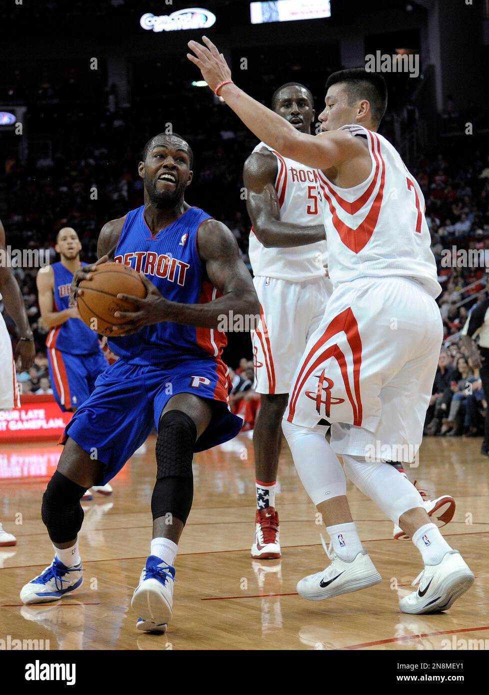 Detroit Pistons' Rodney Stuckey left, goes to the basket guarded while ...