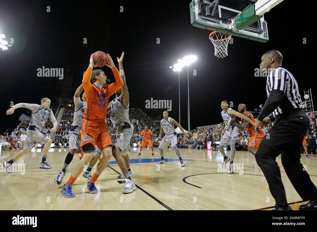 Florida's Erik Murphy (33) takes a shot against Georgetown's Mikael ...