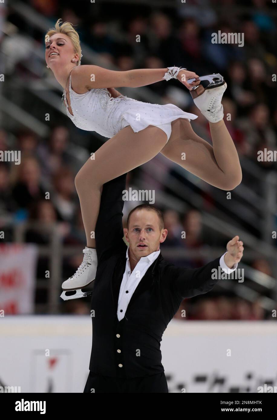 Caydee Denney and John Coughlin, of the United States, perform their ...