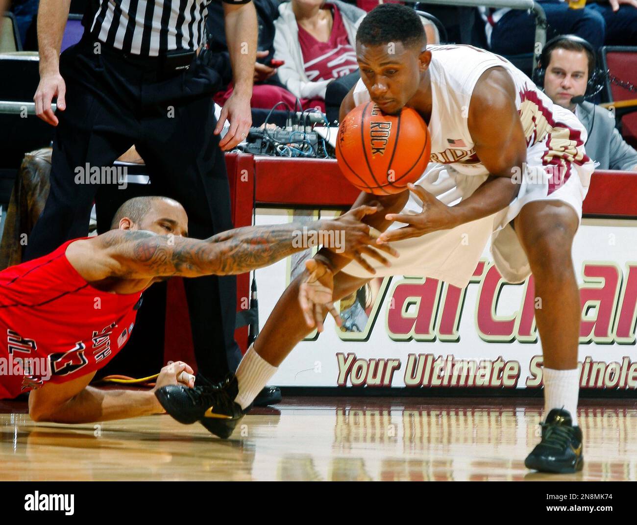 South Alabama guard Mychal Ammons (13) fouls Florida State guard Ian ...