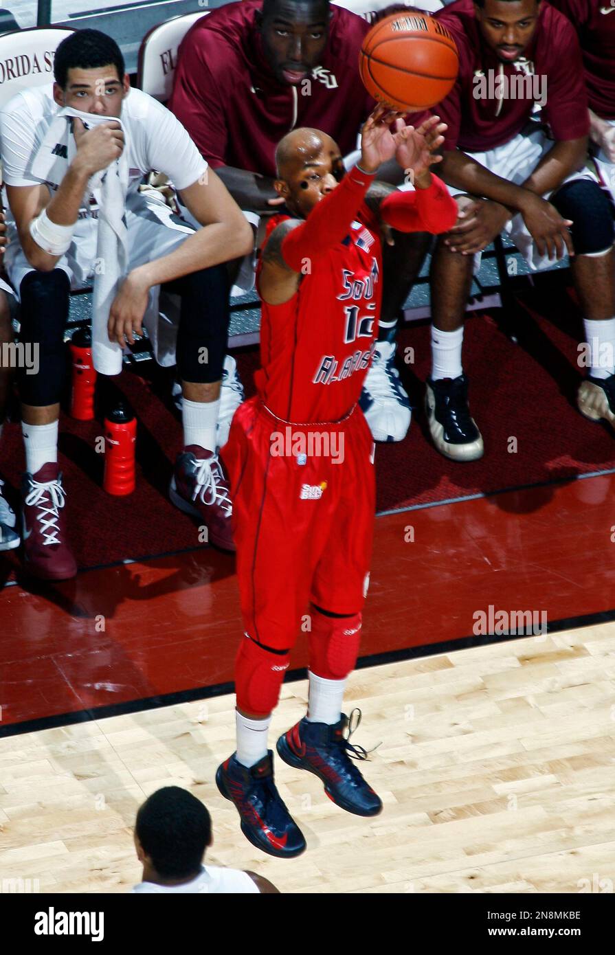South Alabama guard Antoine Allen (12) shoots a 3-pointer in the first ...