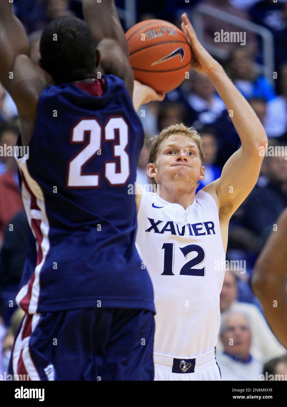 Xavier guard Brad Redford (12) shoots a three-point shot against ...