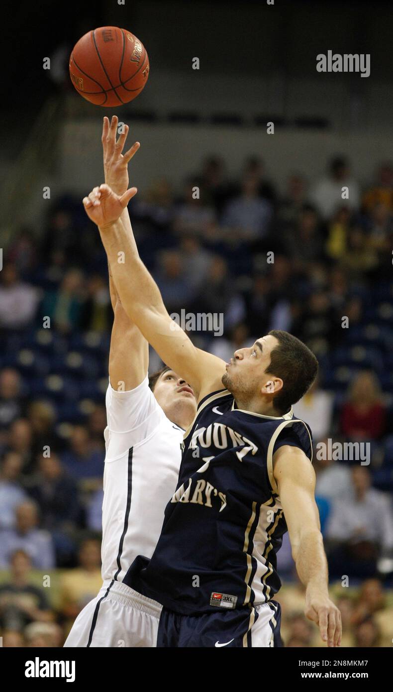 Pittsburgh's Steven Adams, left, and Mount St. Mary's' Kristijan ...