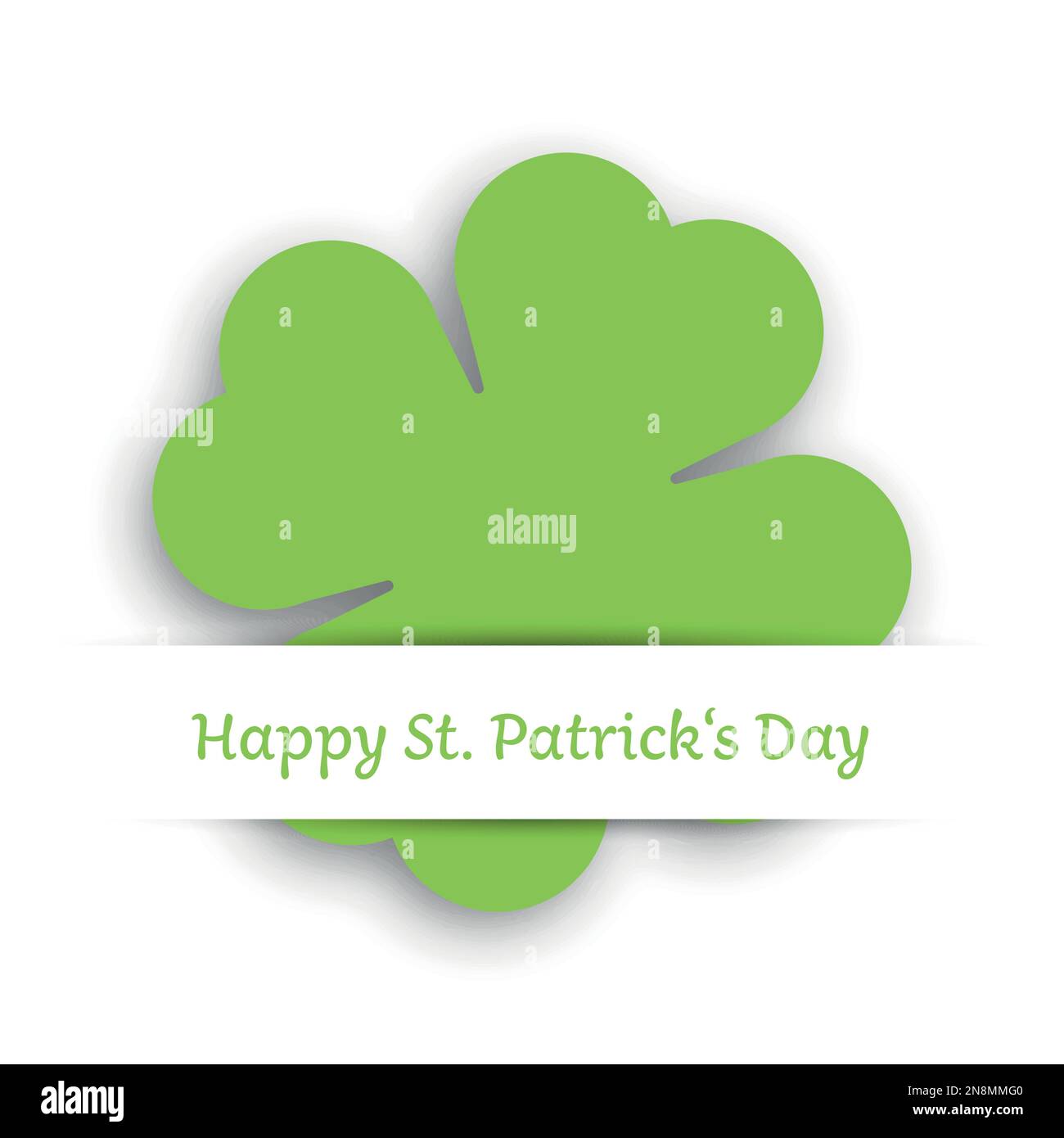 Green cut out four leaf clover attached in the white paper pocket. St ...