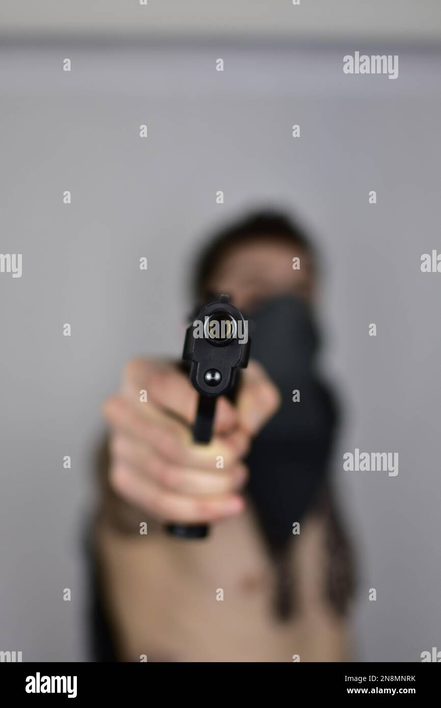 Man pointing gun at camera hi-res stock photography and images - Alamy