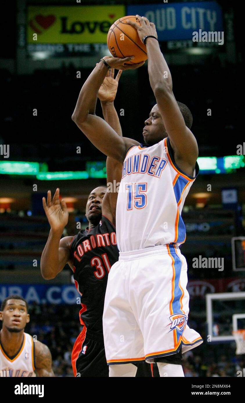 Oklahoma City Thunder point guard Reggie Jackson (15) goes up for a ...