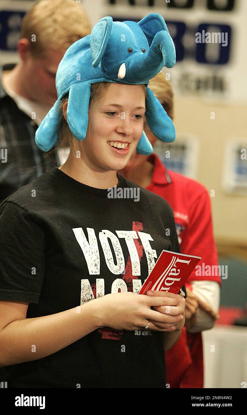Whitney Ellis watches the TV monitors at the Republican Party primary ...