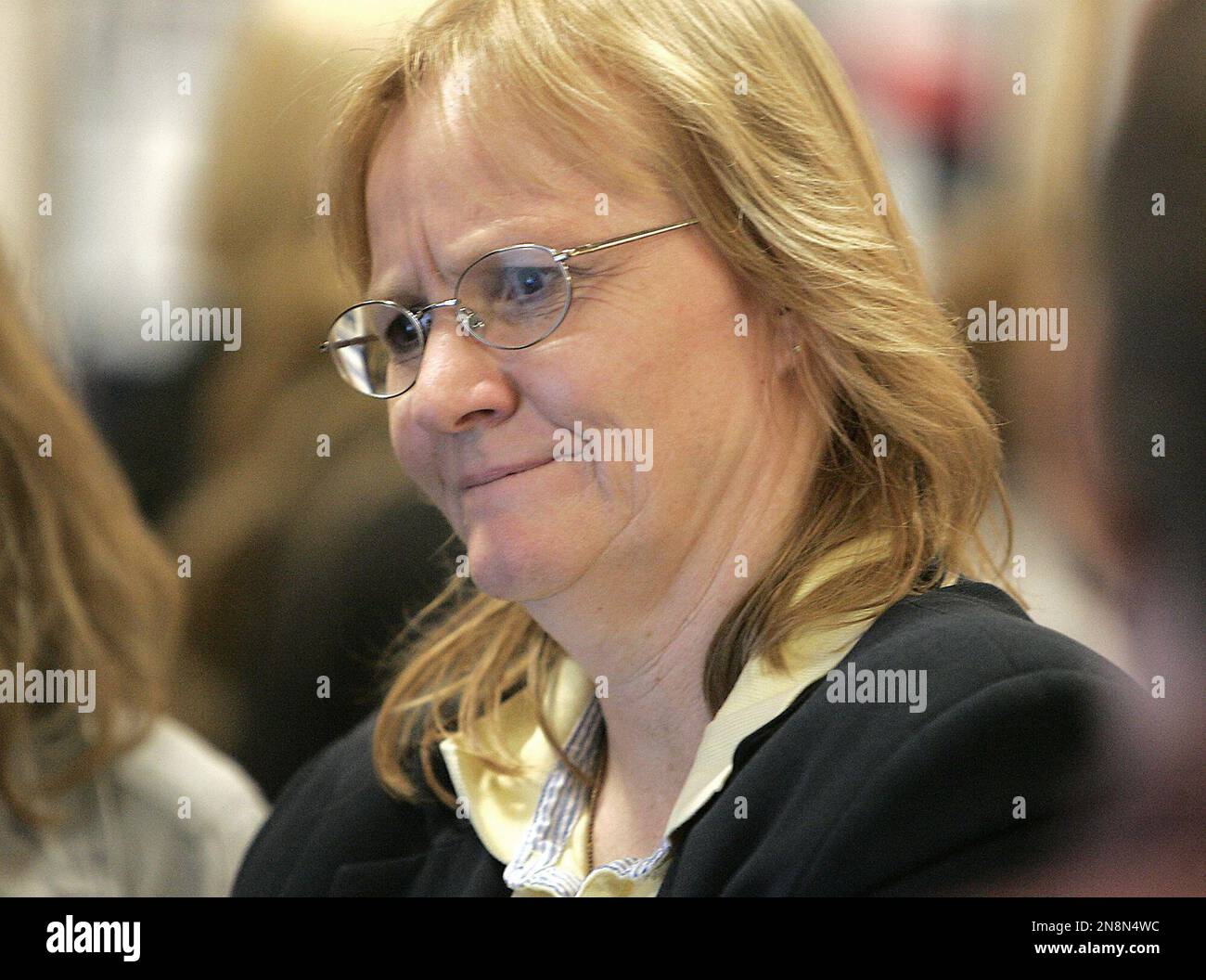 Tana Cory watches the TV monitors at the Republican Party primary ...