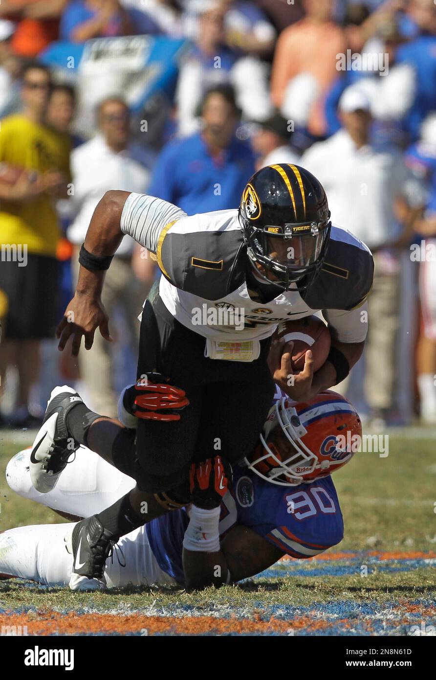 Missouri quarterback James Franklin (1) is sacked by Florida defensive ...