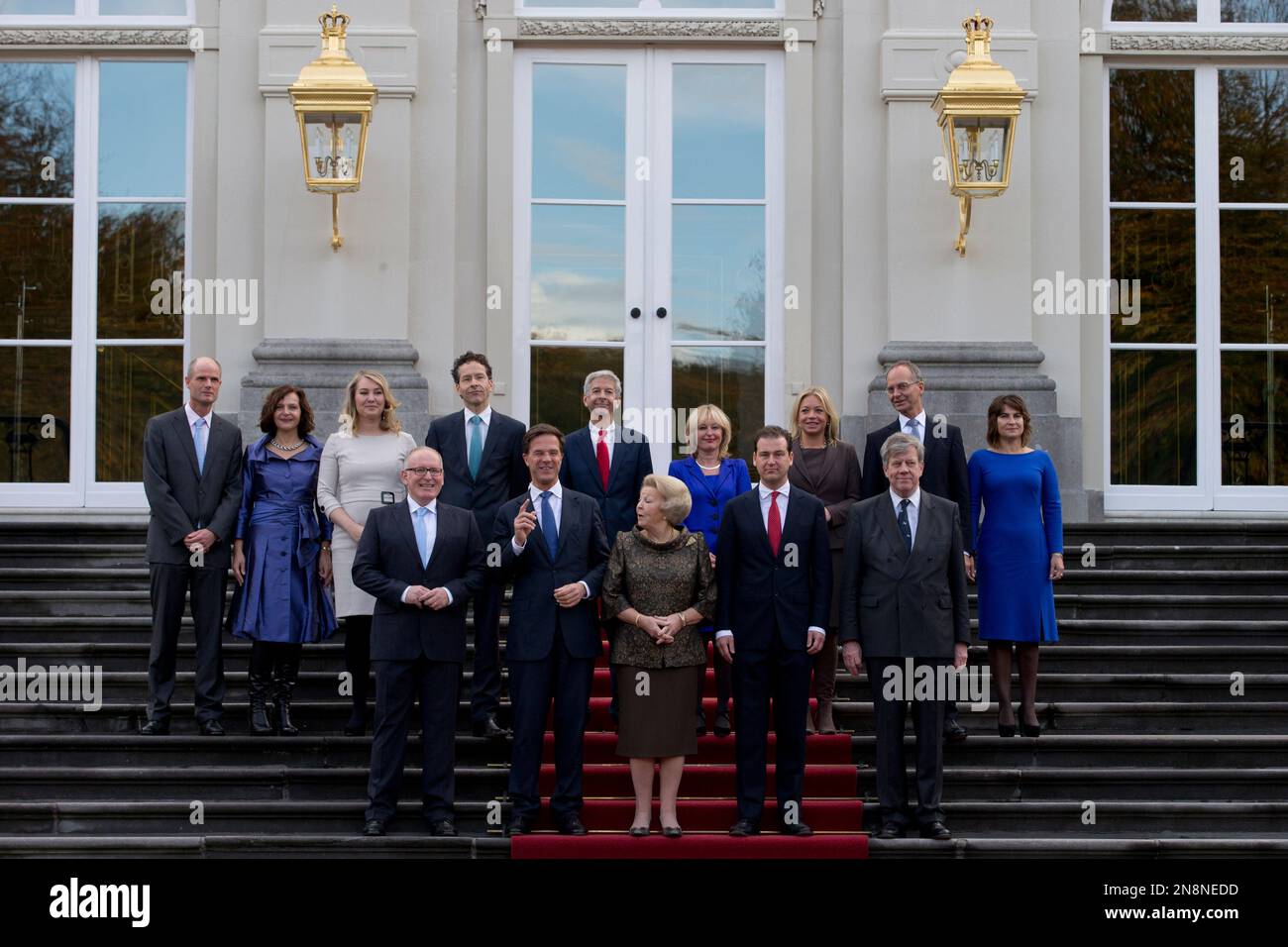 Dutch Prime Minister Mark Rutte points a fingers as he poses with other ...