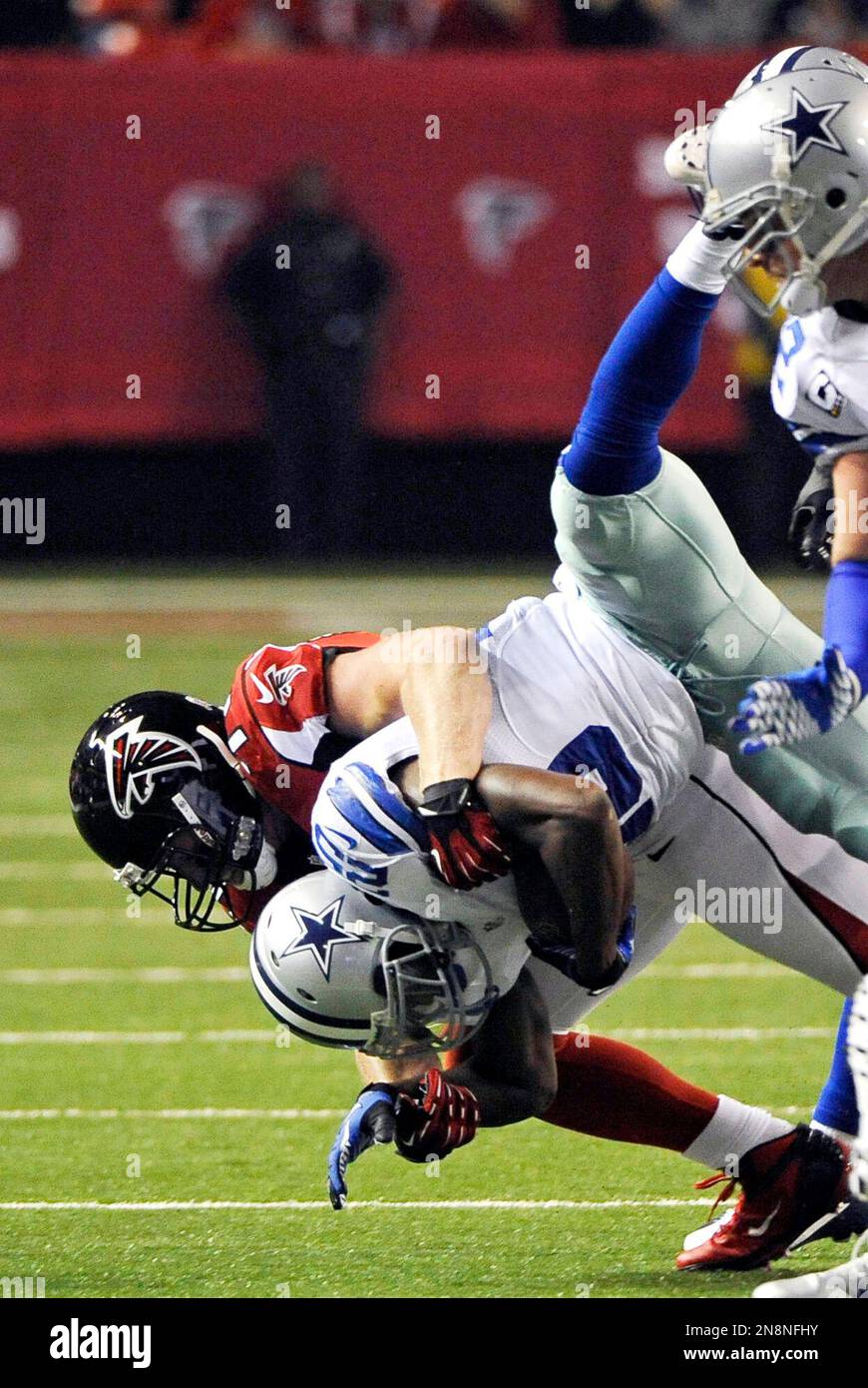 Atlanta Falcons defensive end Kroy Biermann (71) tackles Dallas Cowboys running back Lance ...