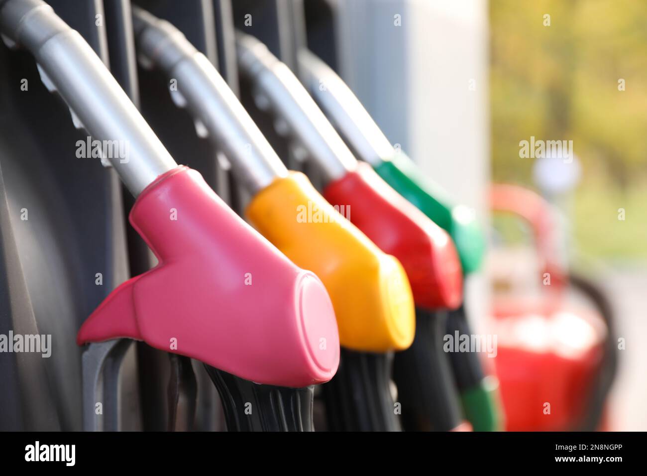 Petrol pump filling nozzles at gas station, closeup Stock Photo - Alamy