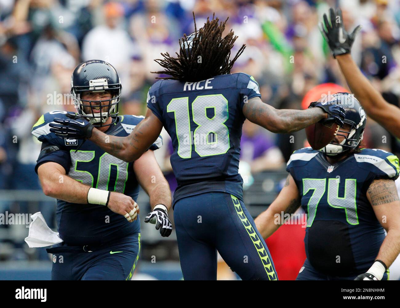 Seattle Seahawks' Sidney Rice (18) celebrates his touchdown against the ...
