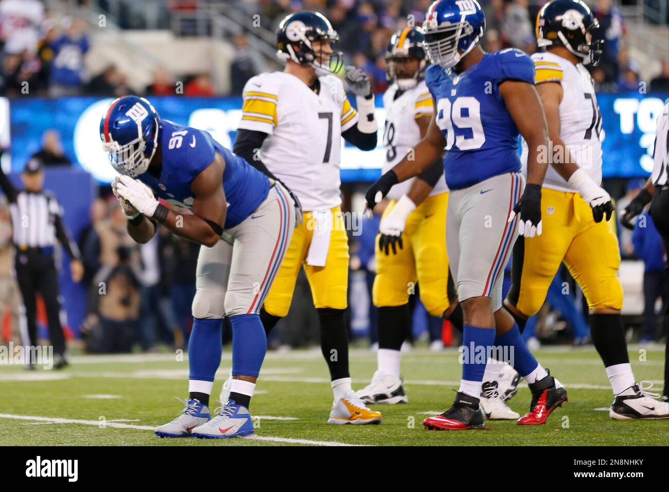 New York Giants defensive end Justin Tuck (91) celebrates after sacking ...
